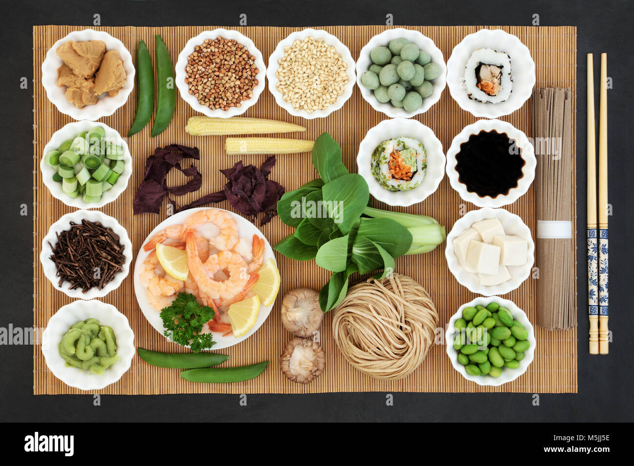 Macrobiotic Japanese food concept with seafood, sushi, miso and wasabi ...