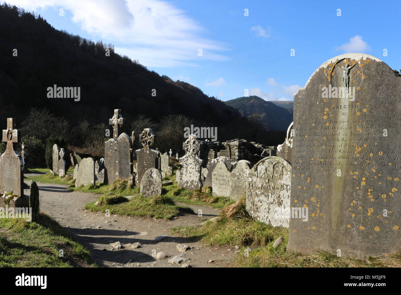 GLENDALOUGH, IRELAND - February 20 2018: The ancient cemetery in ...