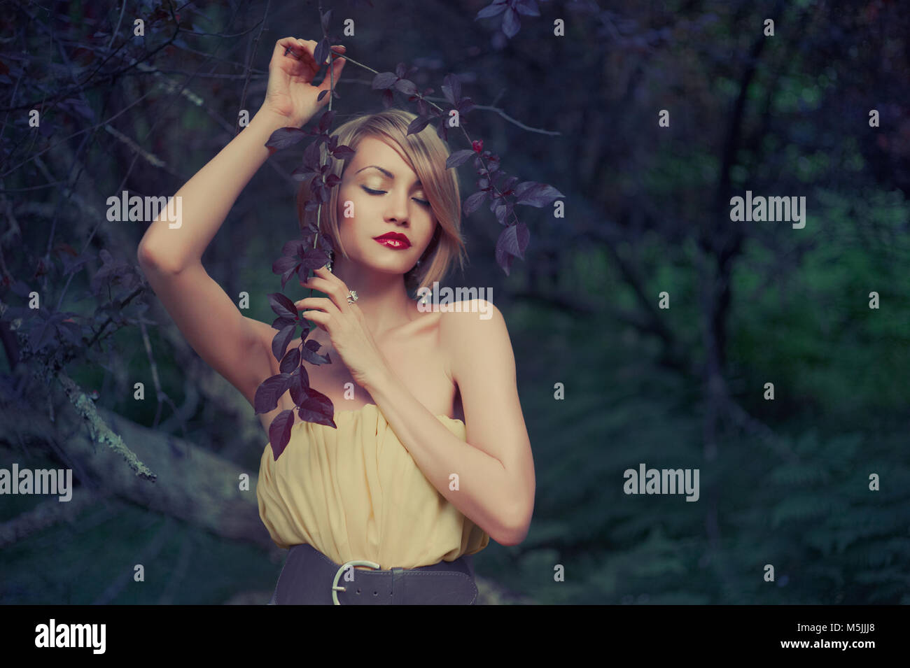 Fairy in light charming dress hi-res stock photography and images - Alamy