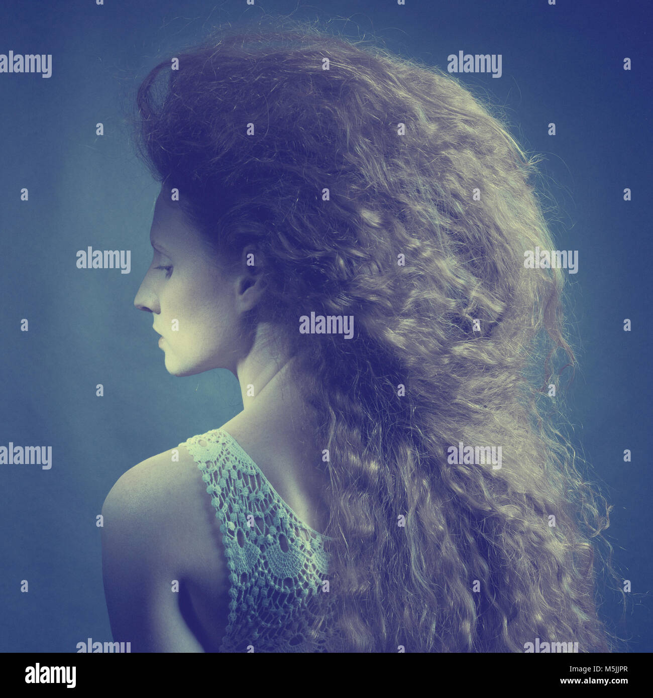 Photo of young beautiful woman with magnificent hair Stock Photo - Alamy