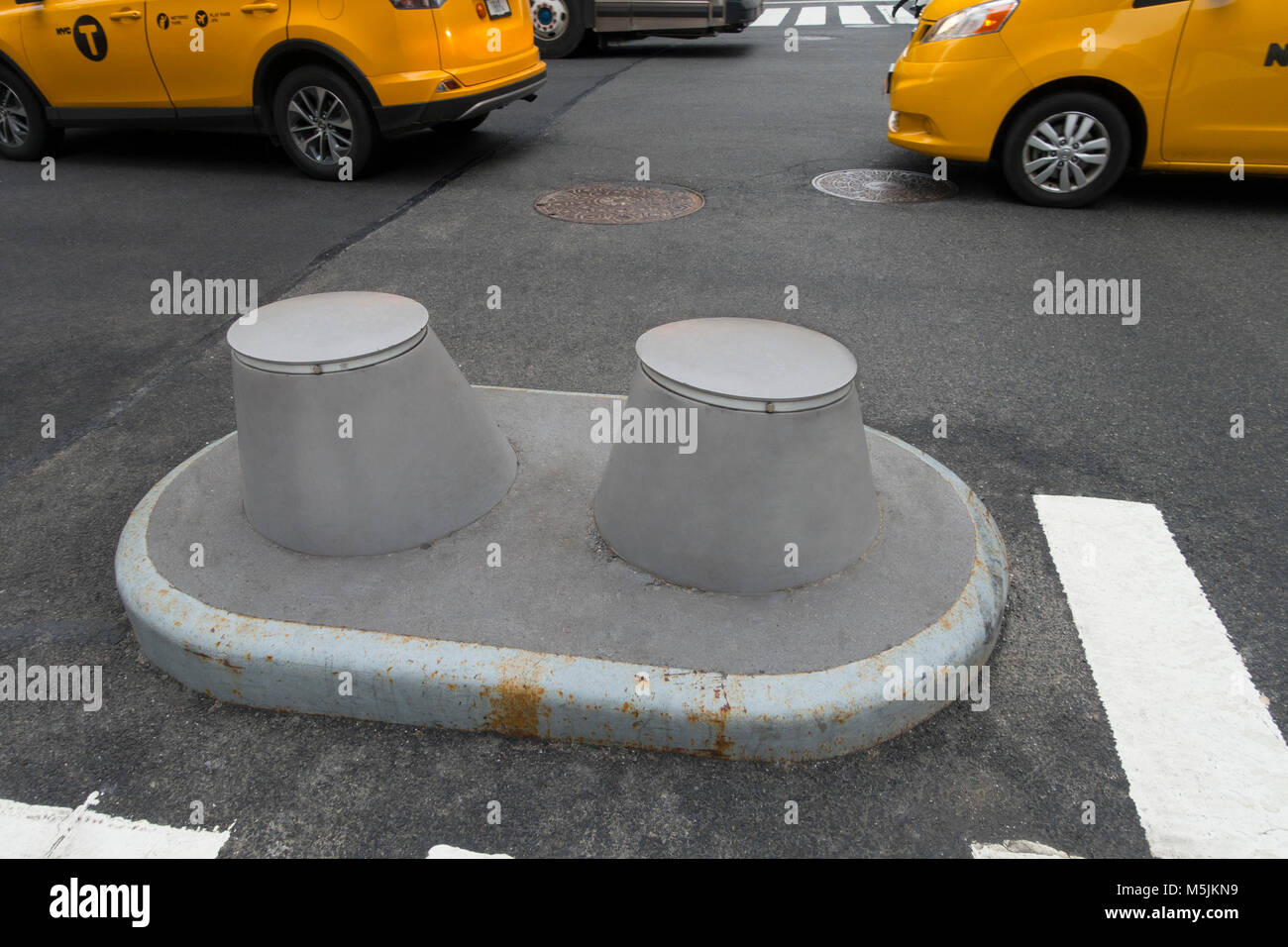 blockers to protect people from cars trucks and busses Stock Photo - Alamy