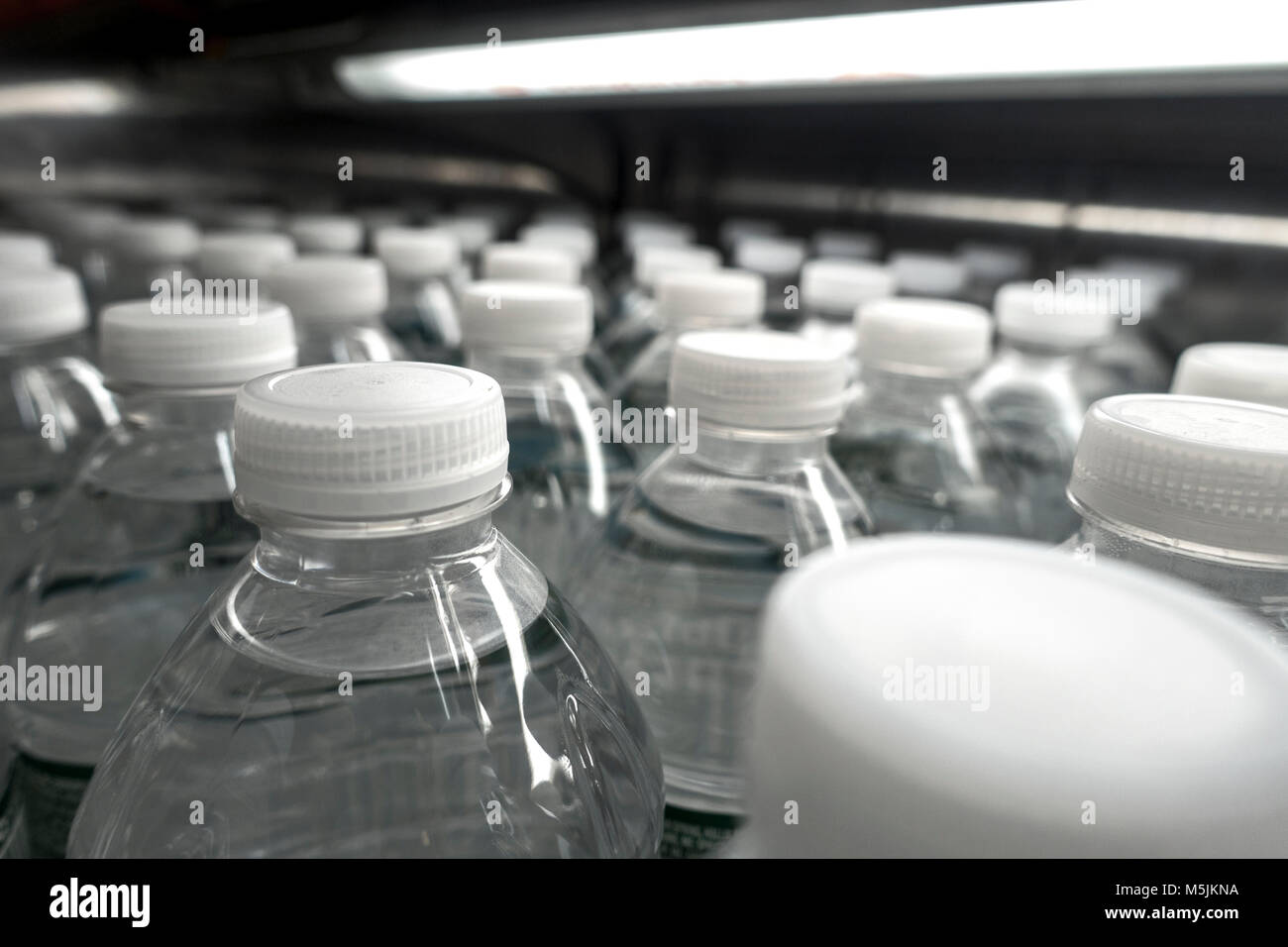 bottled water assembly line displaying Stock Photo - Alamy