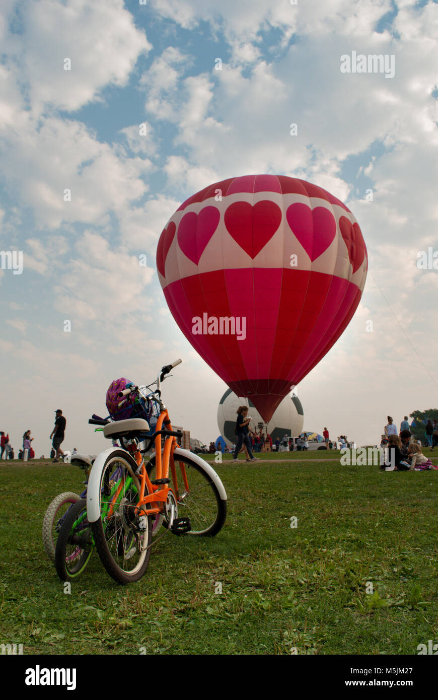 Early morning, hot air balloons fly over Colorado Springs, Colorado for ...