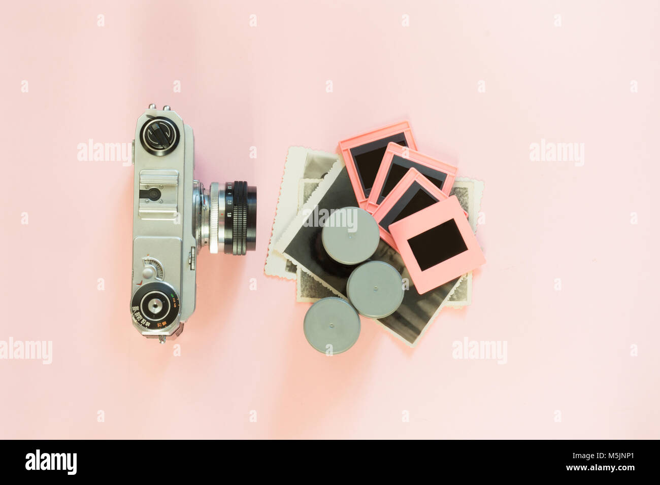 Old retro camera with three box for film photo slides on pink ...