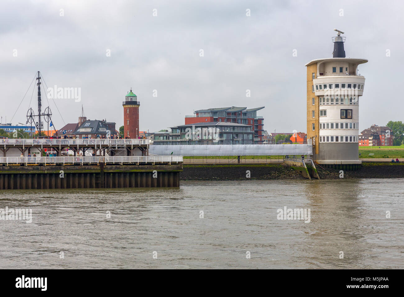 German harbor Cuxhaven with lighthouse and radar tower shipping ...