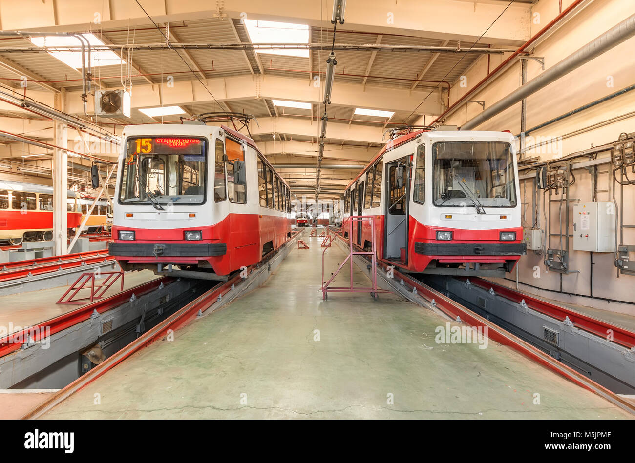 Trams at regular maintenance inside the tram depot Stock Photo - Alamy