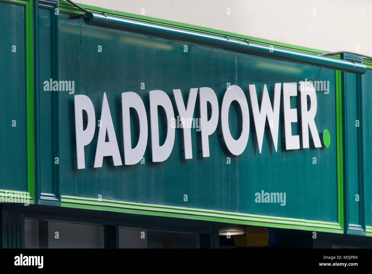 paddy power bookies betting shop store sign logo Stock Photo - Alamy