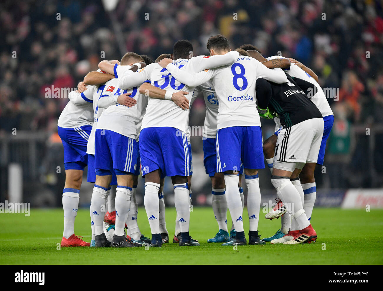 Teambuilding,soccer players FC Schalke 04 forming a circle before start ...