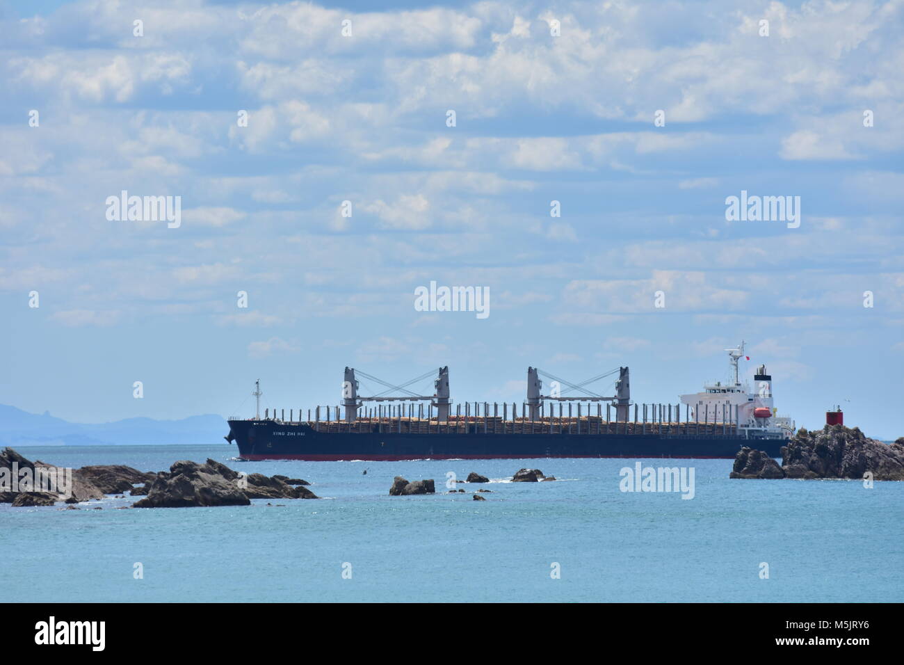 Tree trunks river tugboat hi-res stock photography and images - Alamy