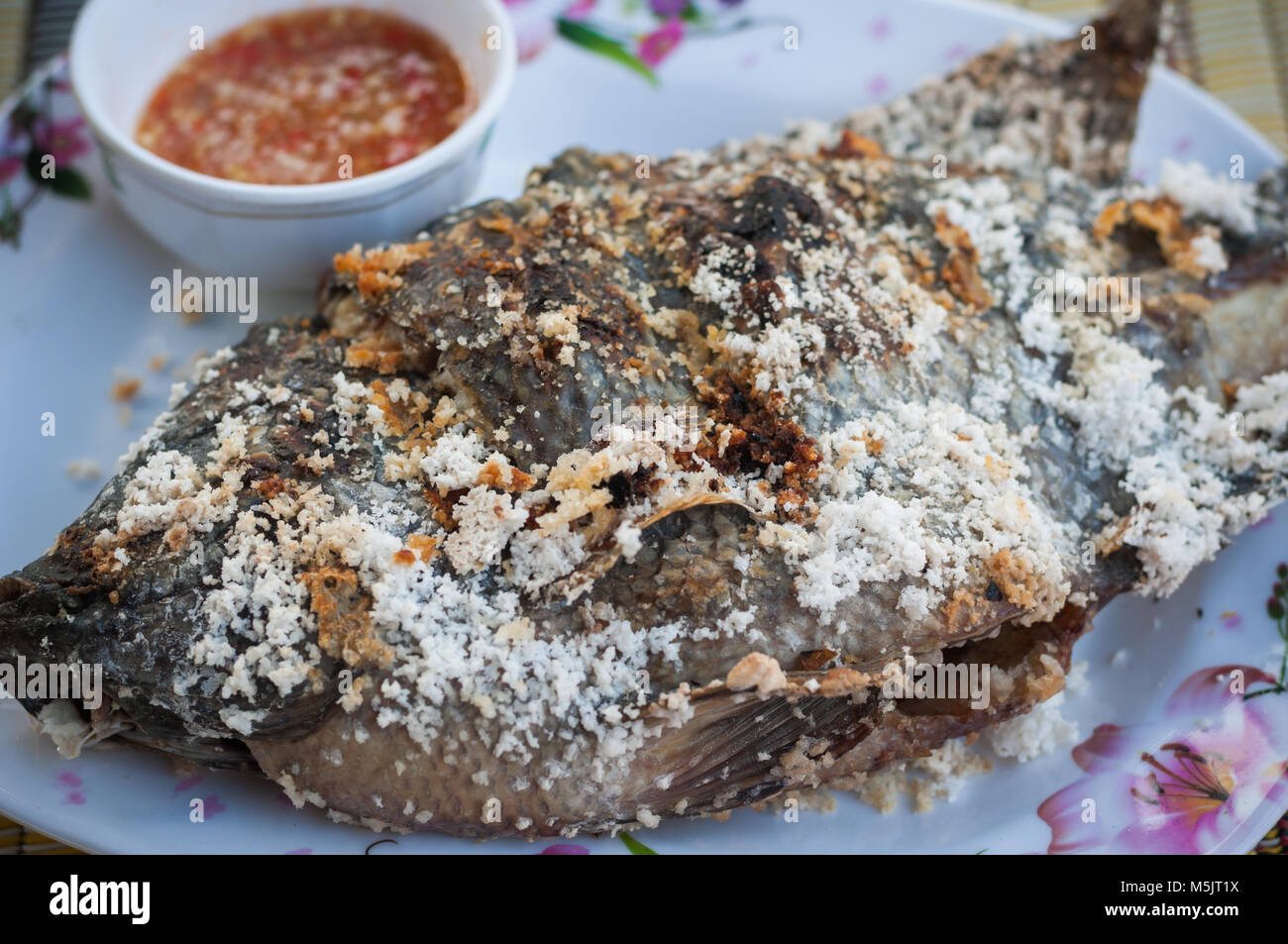 Close up Nile tilapia fish grilled salt body scale background Stock ...