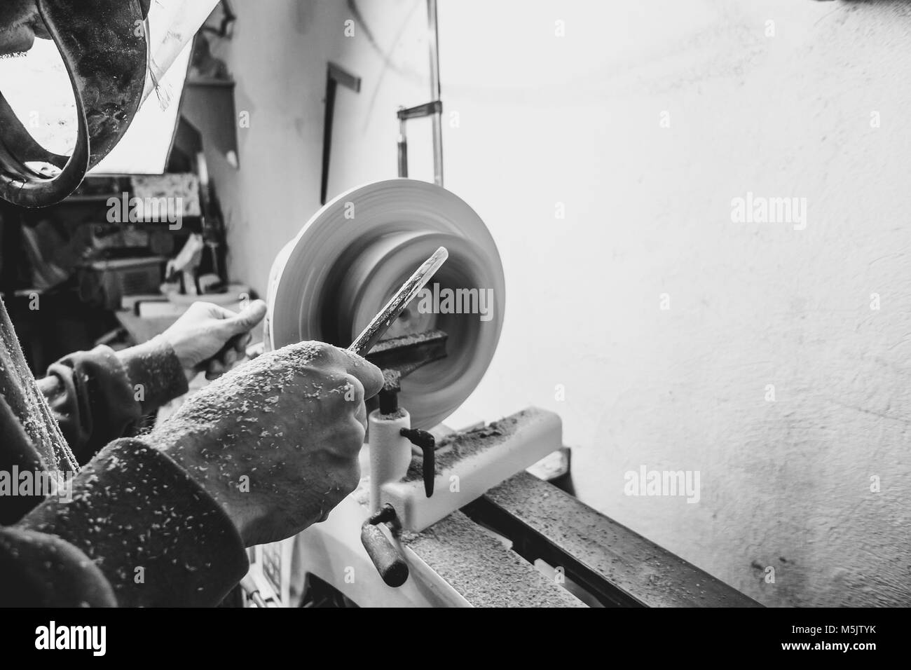 Wood turner turning on lathe Black and White Stock Photos & Images - Alamy