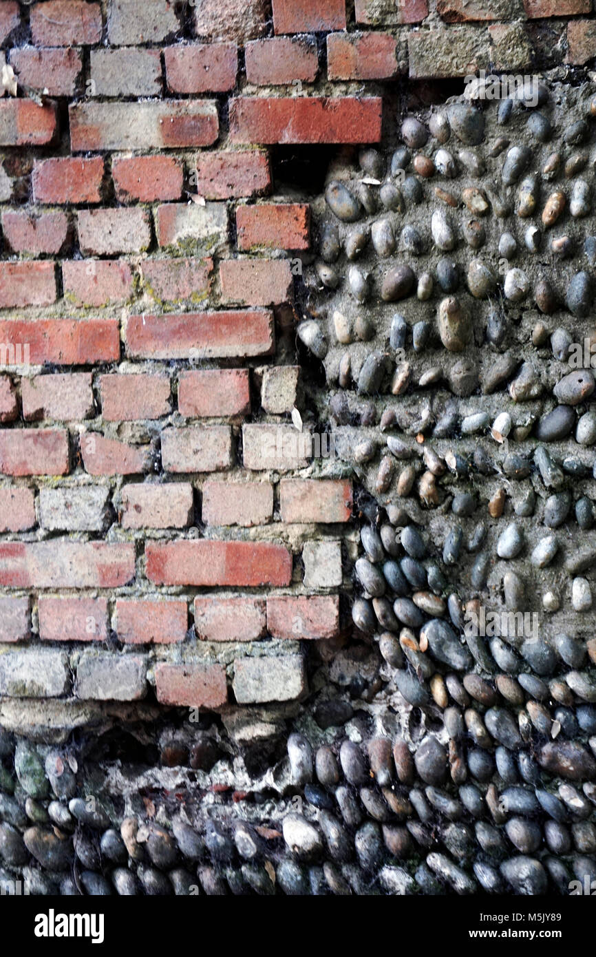 half brick half pebble wall Stock Photo - Alamy