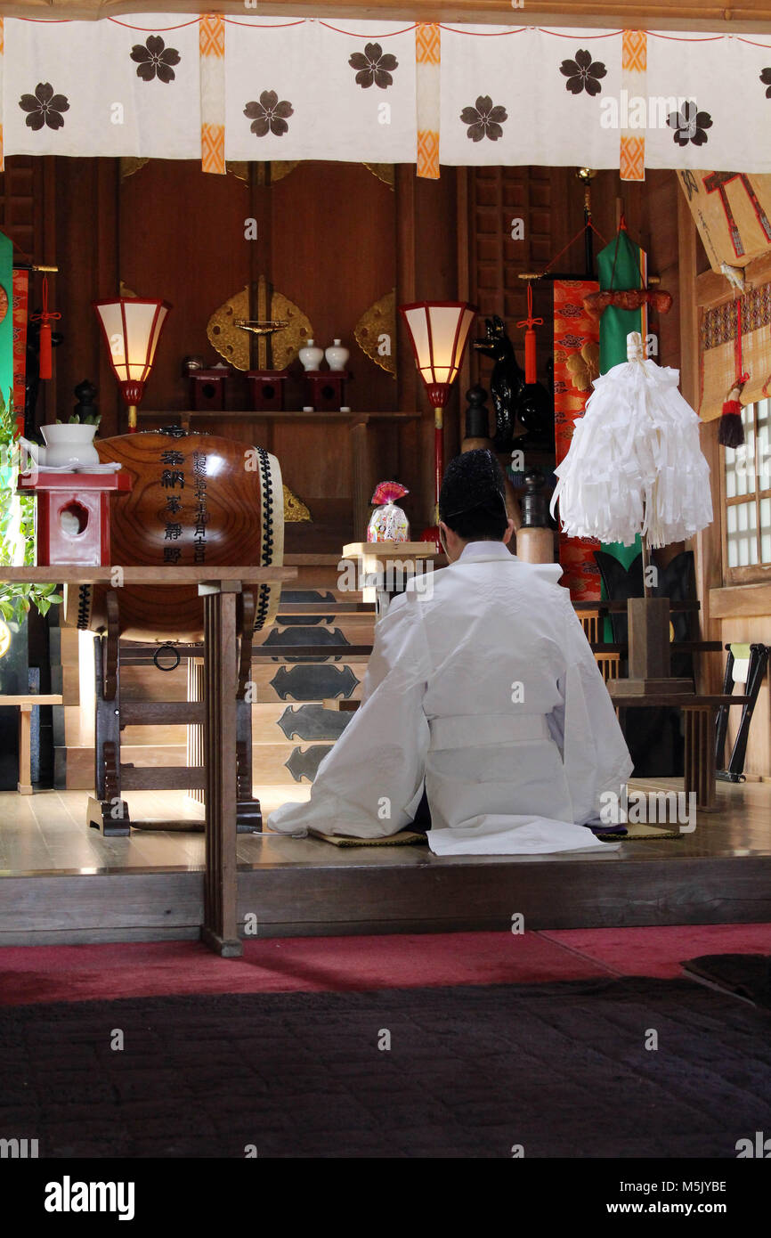 A Shinto priest leading a ritual at Onechi Shrine. Taken in Iizuka ...