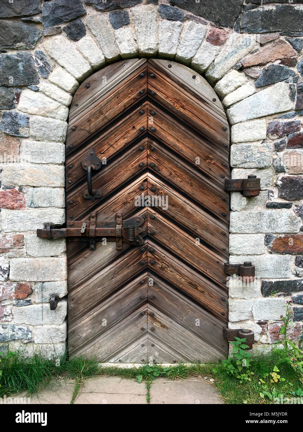 Old door in a fortress Stock Photo - Alamy