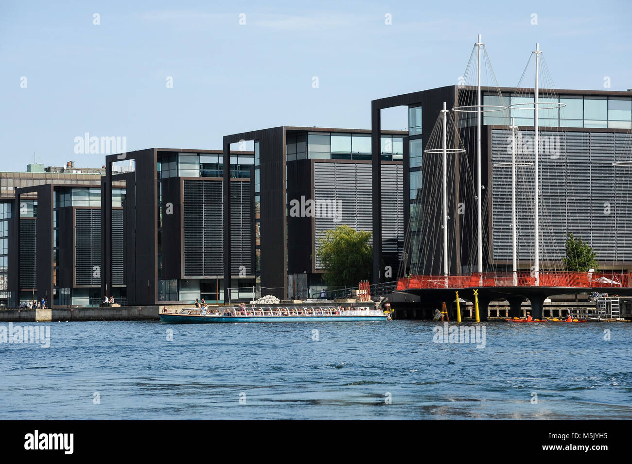 Modern office buildings and Cirkelbroen (Circle Bridge) designed by ...