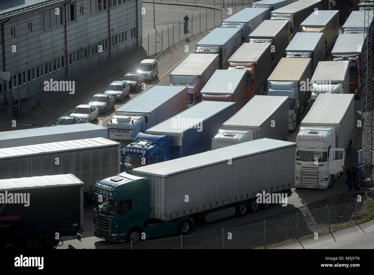 Line of trucks waiting to enter the cruiseferry MS Stena Vision in ...