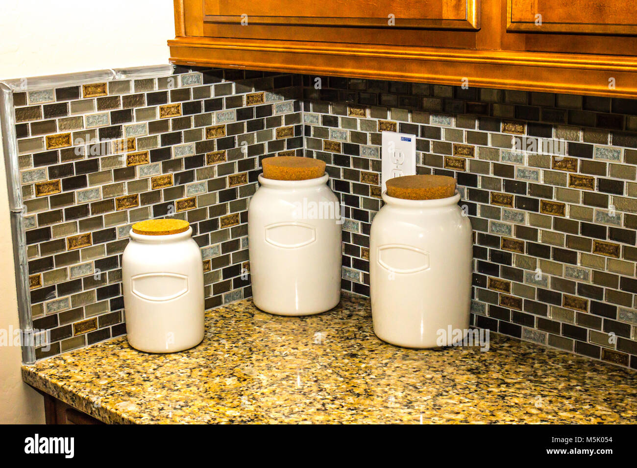 Three Ceramic Decorator Items On Kitchen Counter Stock Photo - Alamy