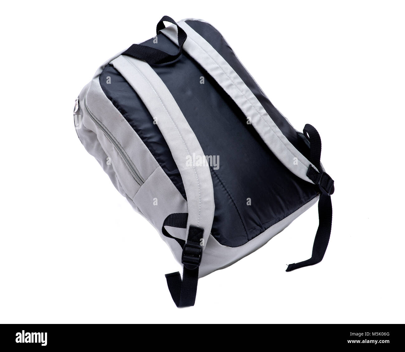 Grey water resistant nylon backpack isolated on white background Stock ...