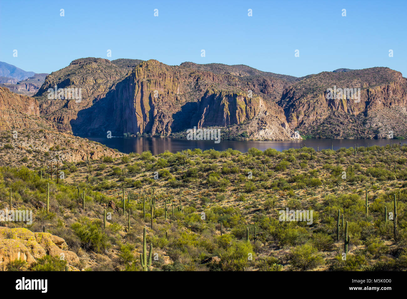 Lake At Base Of Cliffs In Arizona High Desert Stock Photo - Alamy
