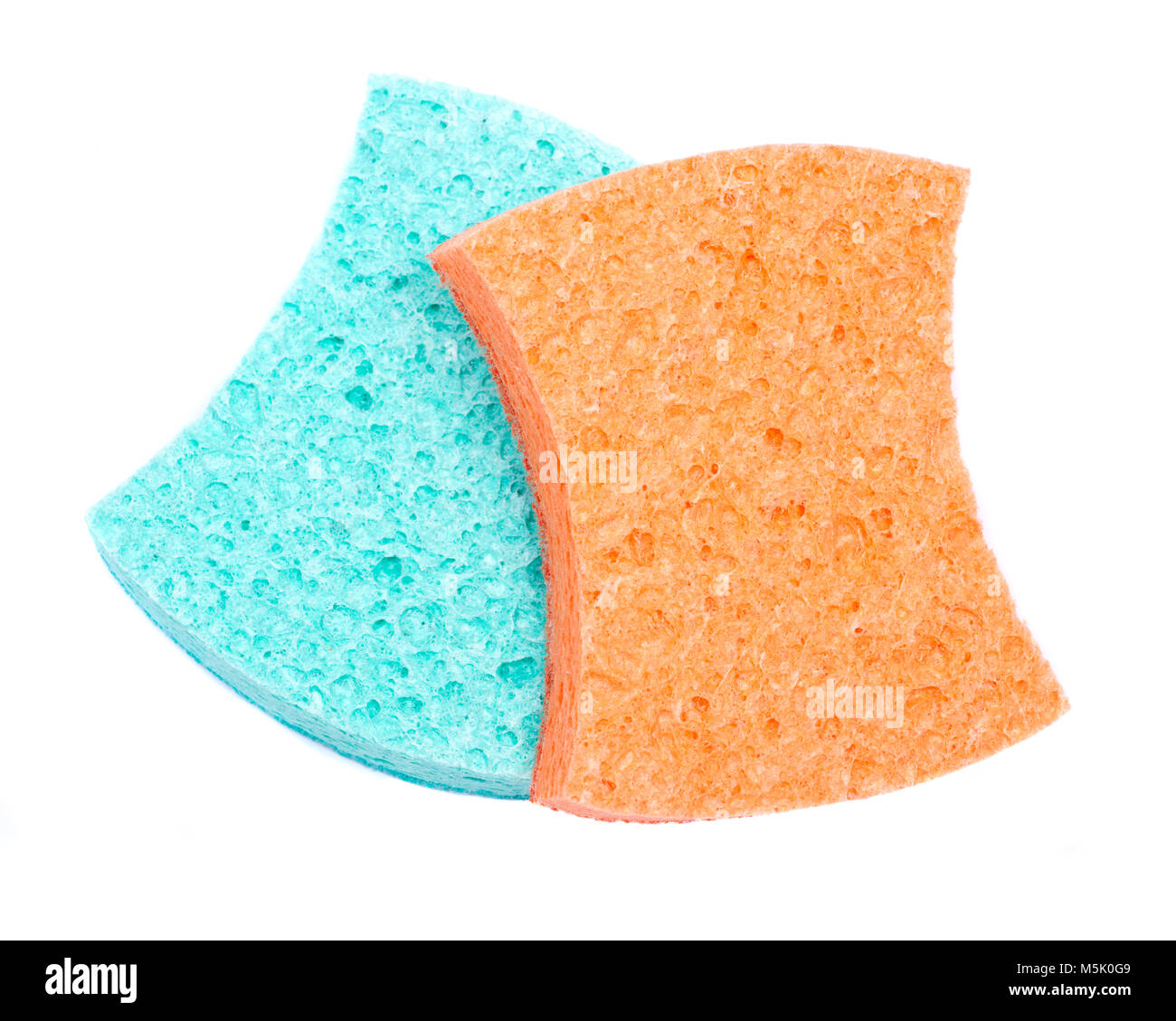 Orange and green non scratch scrubbing sponge isolated on white ...