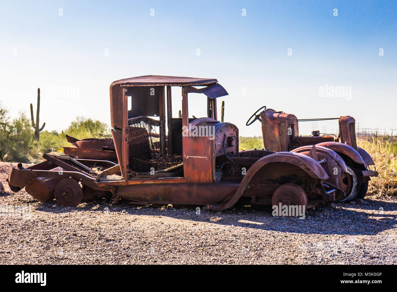 Rusted Shells Of Automobiles Abandoned In Arizona Desert Stock Photo ...