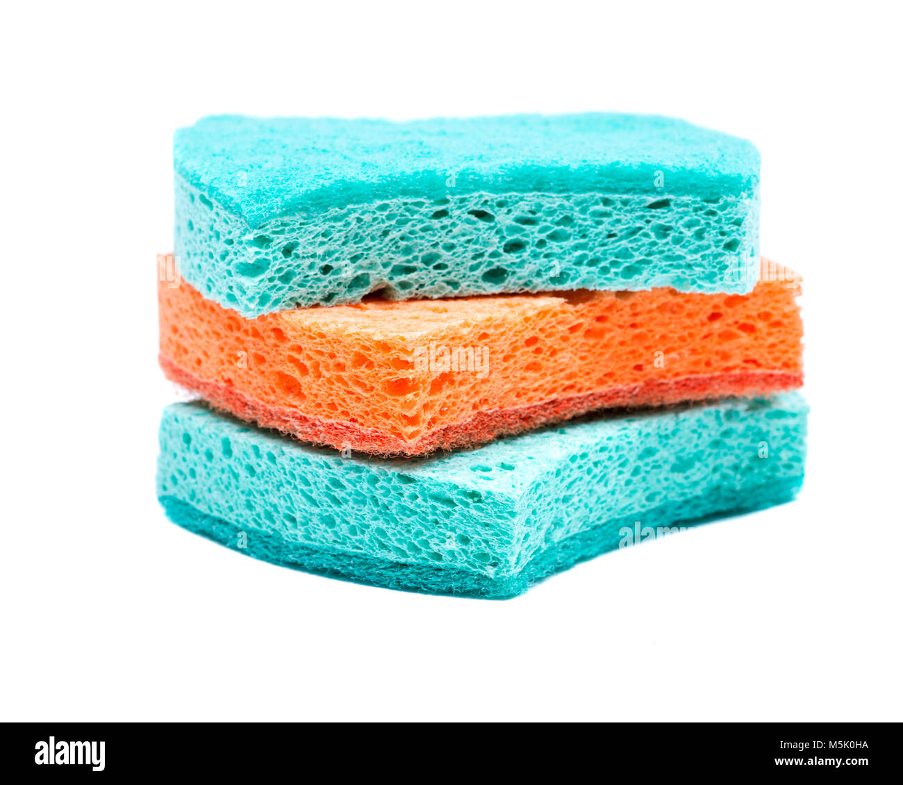 Orange and green non scratch scrubbing sponge isolated on white ...