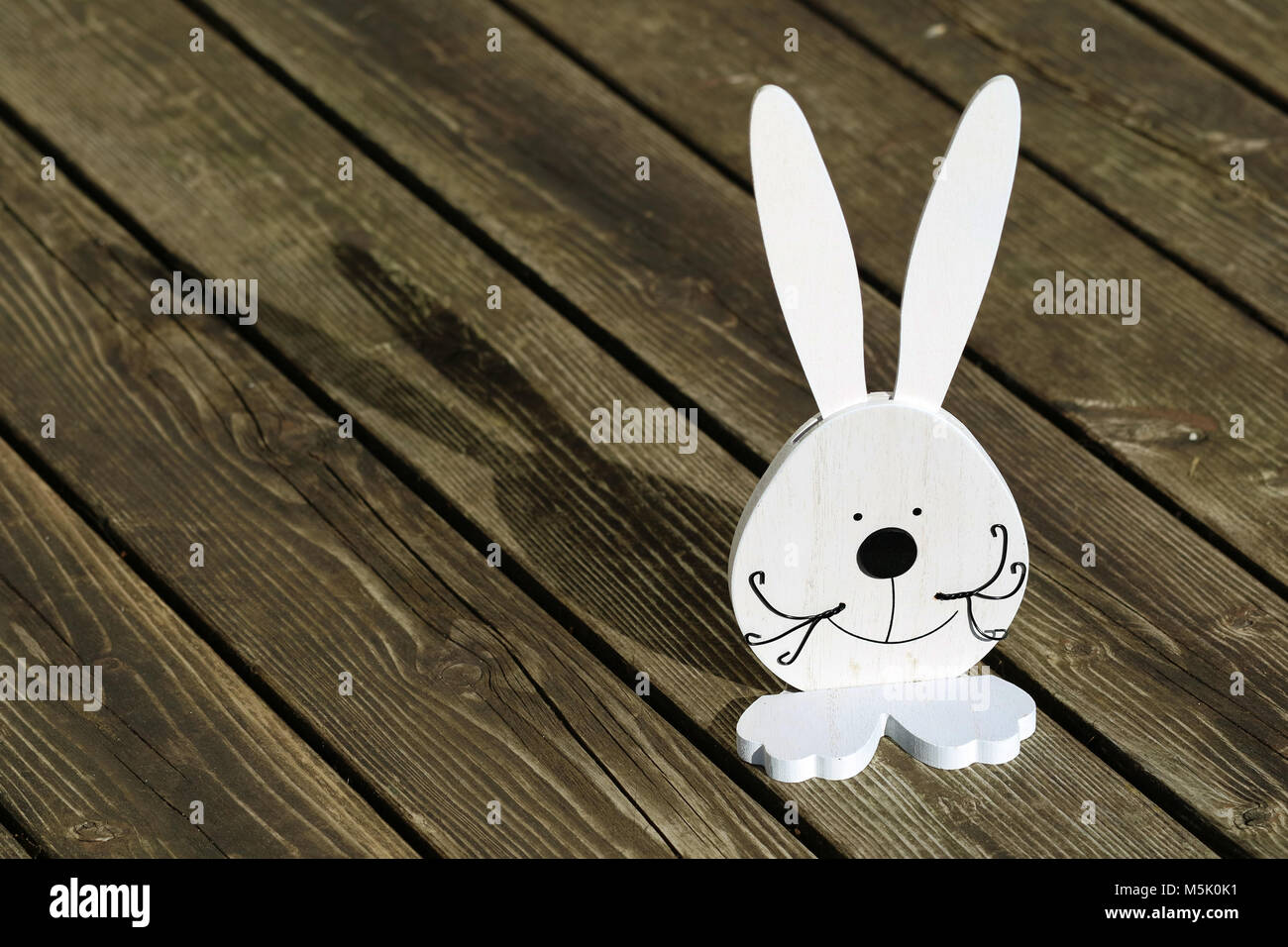 Easter Bunny, Cute white Rabbit on dark Wooden terrace, background ...
