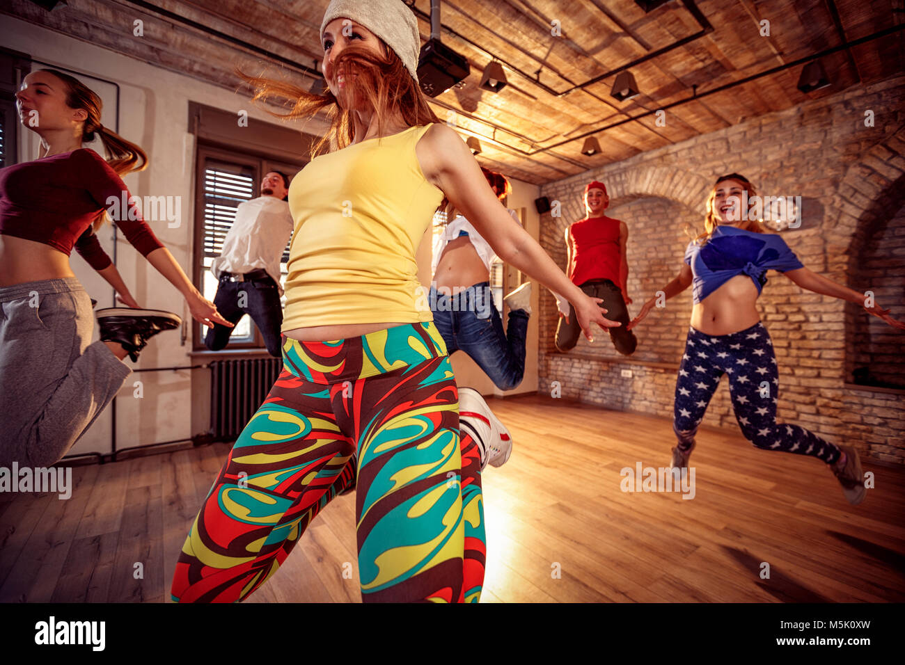 Group of young people practicing dancing Stock Photo - Alamy