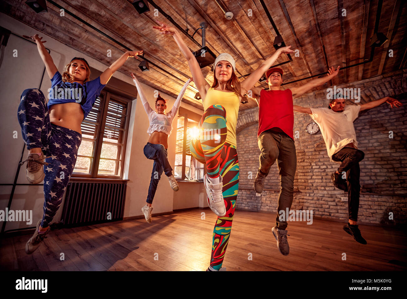 Young modern dancing group practice dancing in jump. Sport, dancing and ...