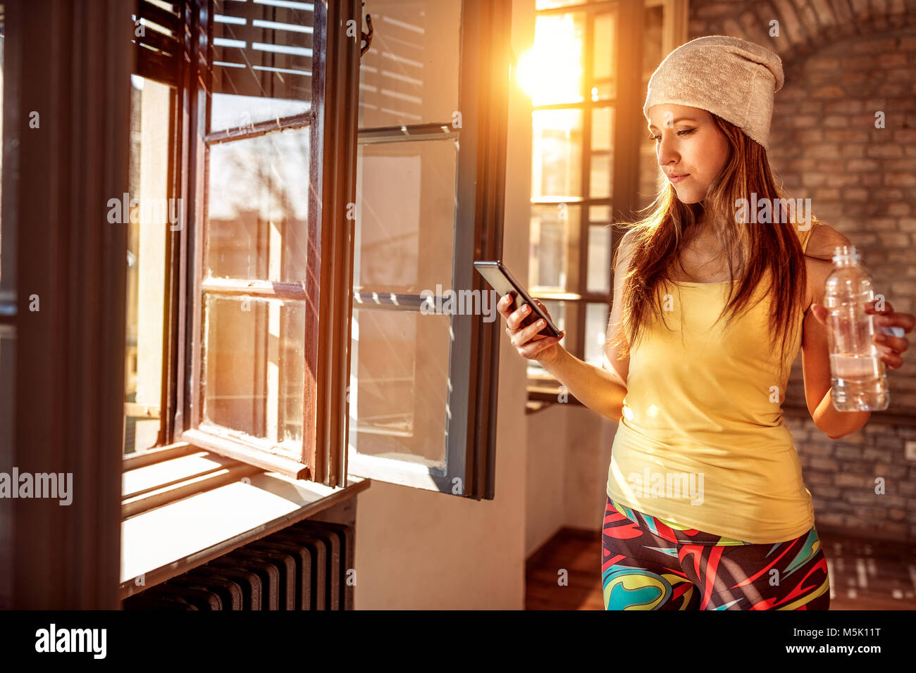 Young girl texting messaging on the smartphone Stock Photo - Alamy