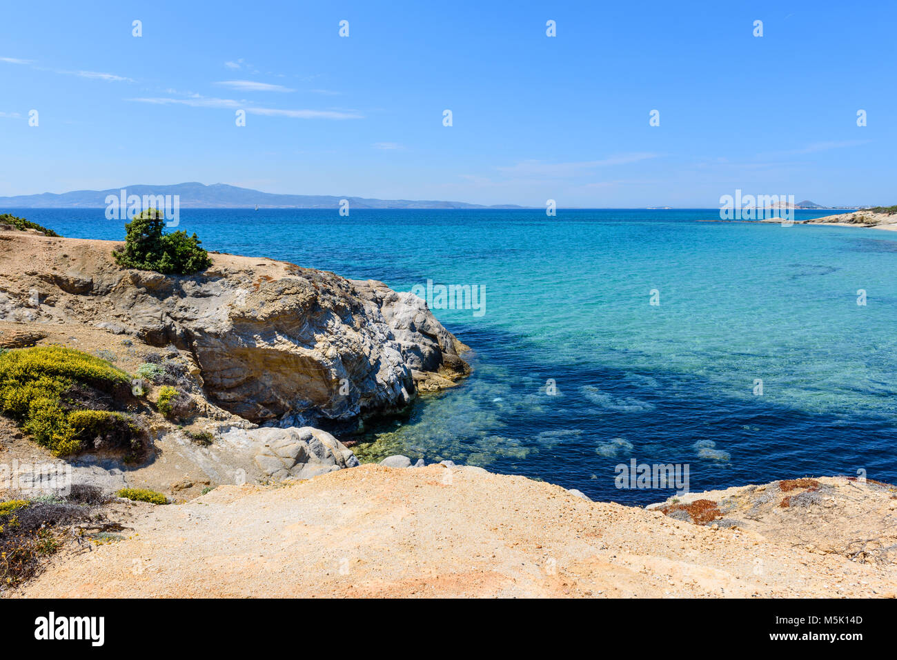 Crystal clear sea water at Aliko beach on Naxos island. Cyclades ...