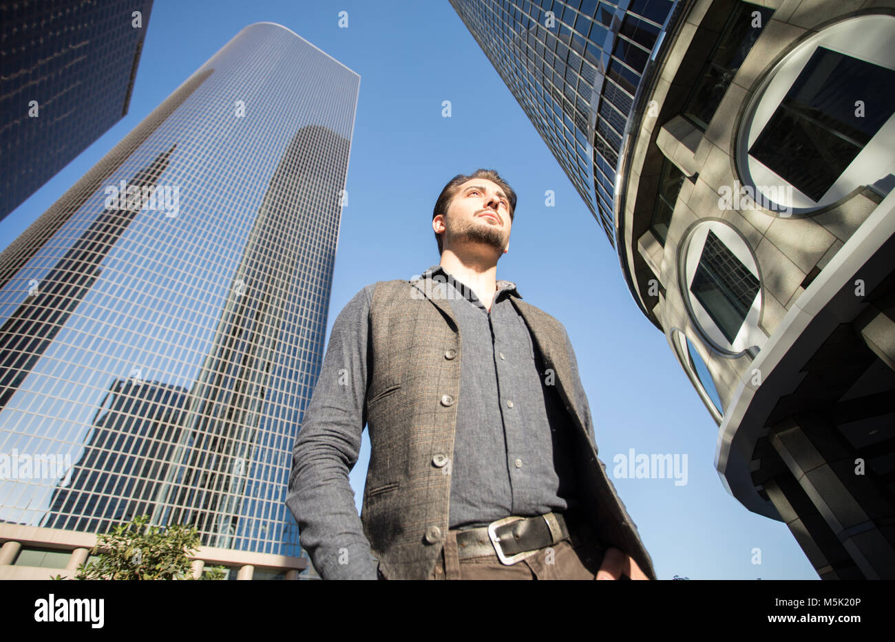 A good looking handsome man walking in the city financial center Stock ...