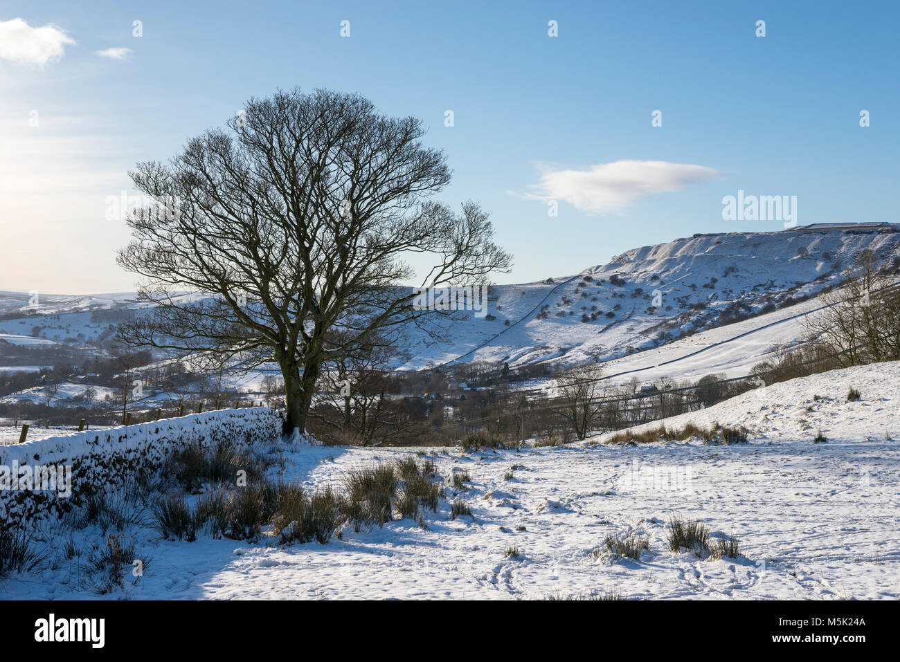 High Peak landscape on a snowy winter morning. View to Cracken edge and ...
