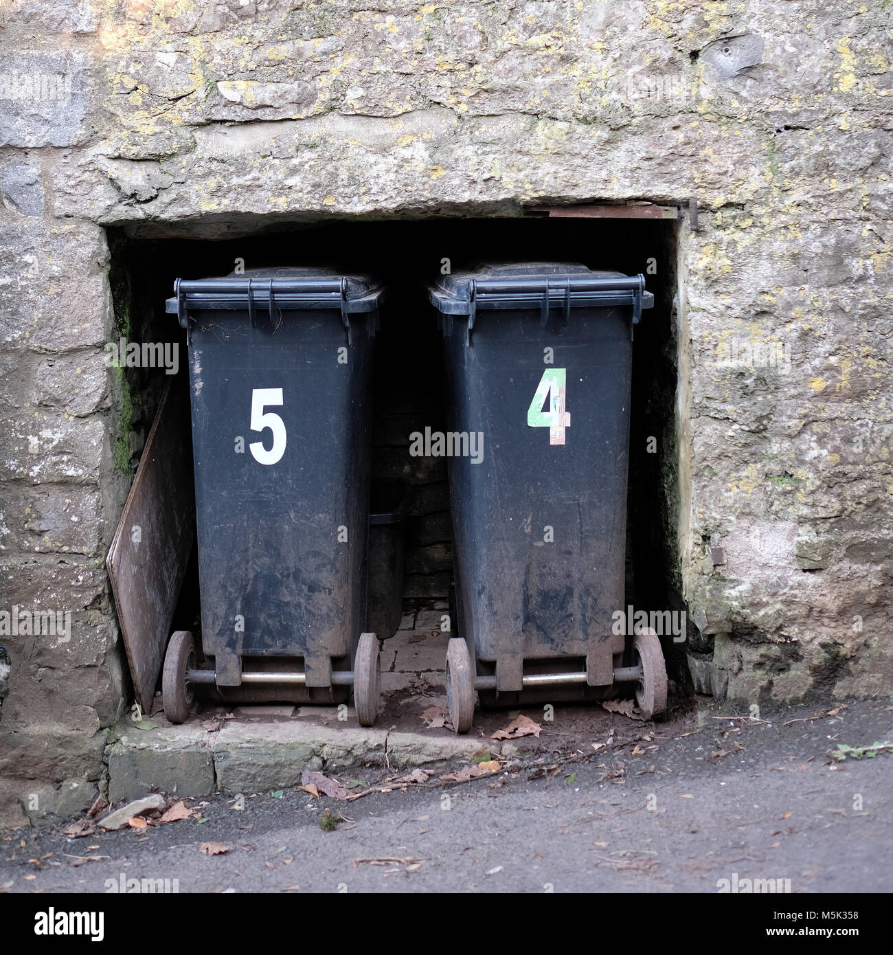 Rubbish bins with house numbers hi-res stock photography and images - Alamy