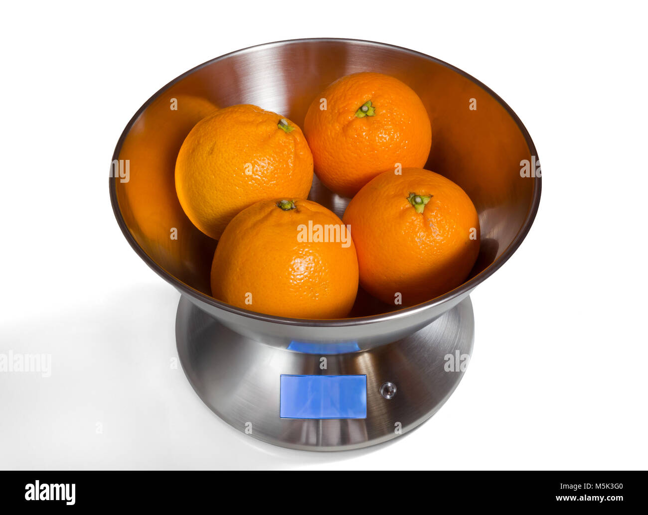 Modern electronic metal kitchen weighing scales with oranges Stock ...