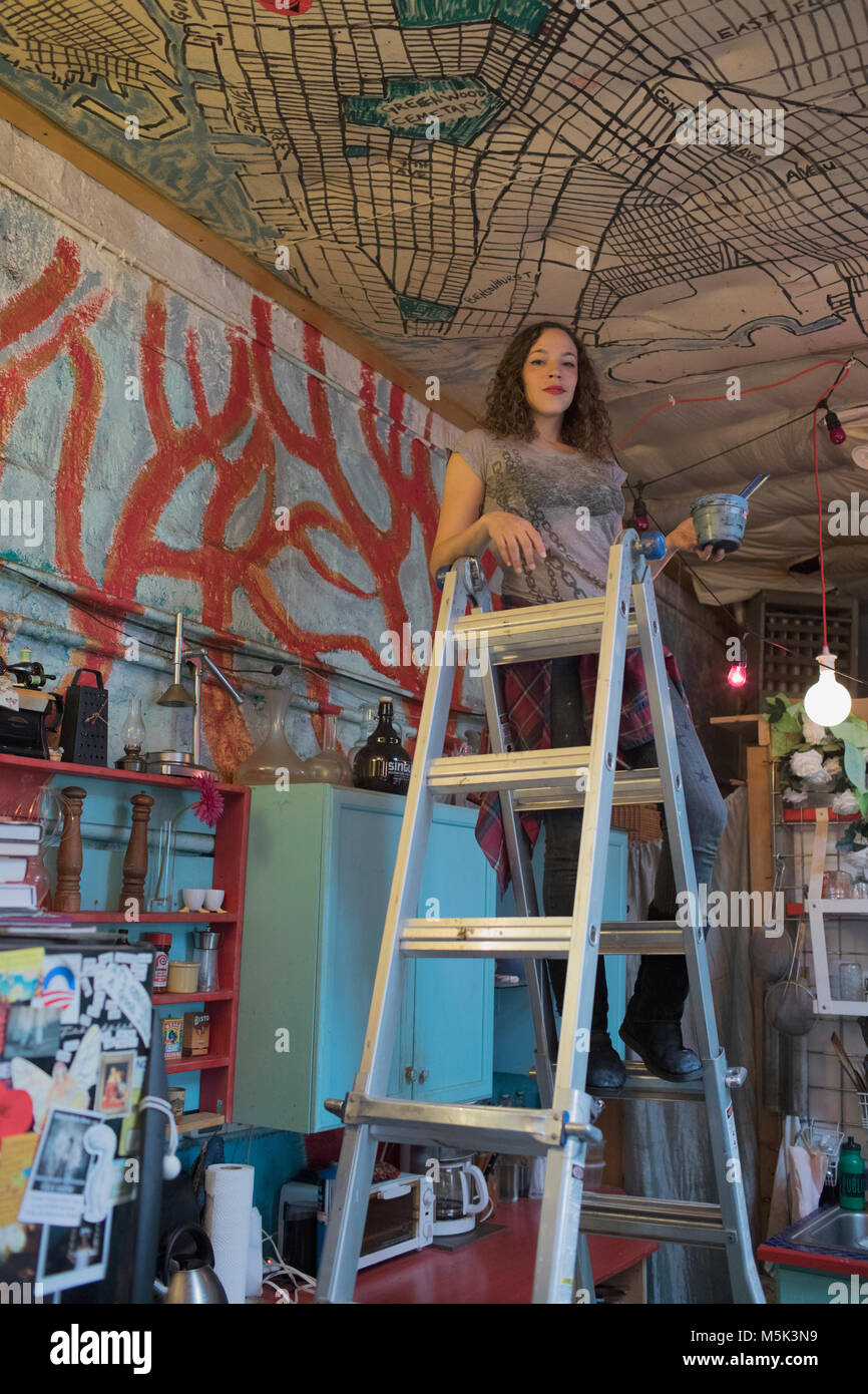 Portrait of young female artist at work Stock Photo - Alamy
