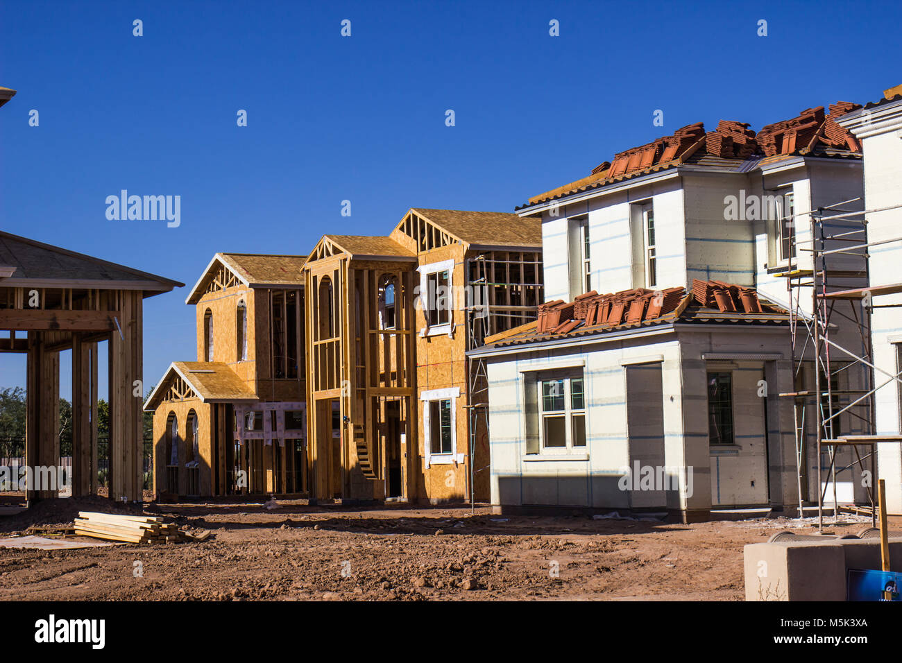 Row Of Two Story Homes Under Construction Stock Photo - Alamy