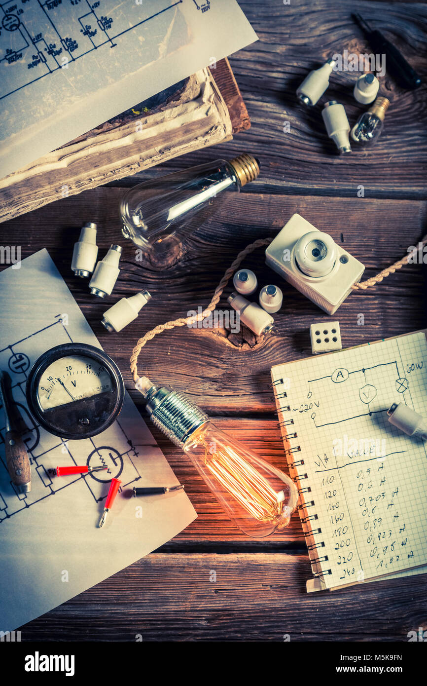 Testing Edison light bulb and electrical diagrams in classroom Stock ...