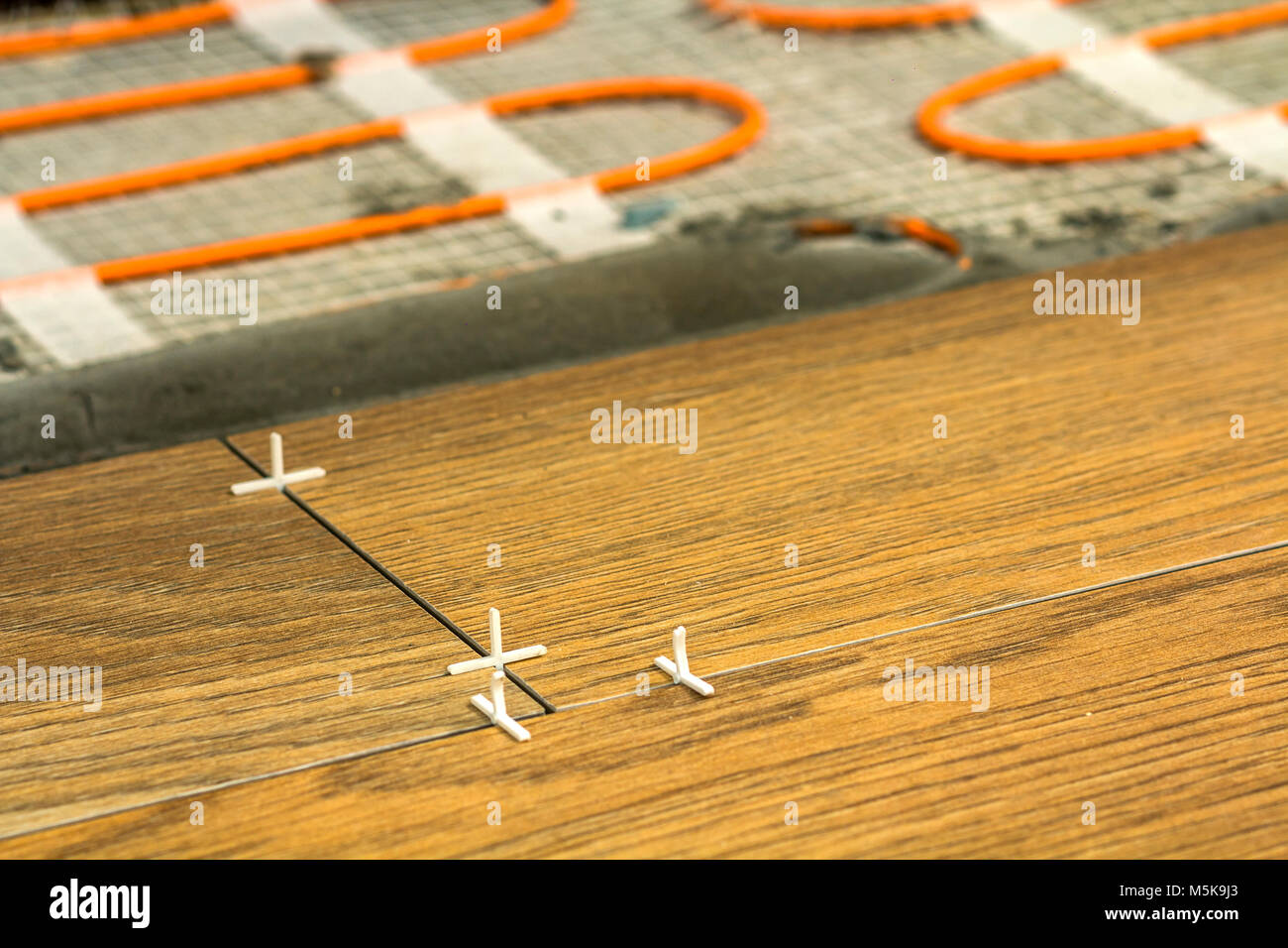 Heating elements under tiles hi-res stock photography and images - Alamy