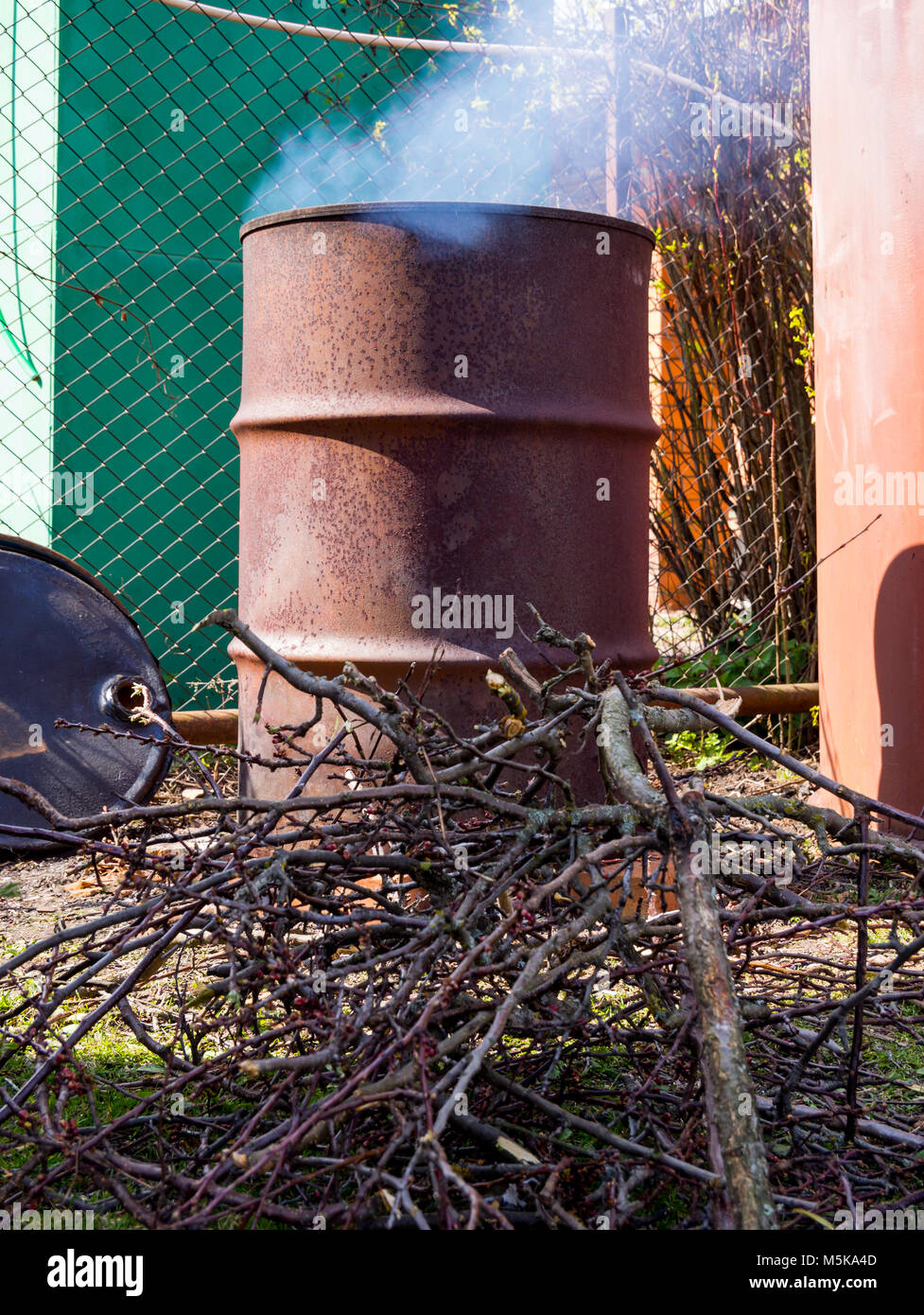 Garbage barrel burning hi-res stock photography and images - Alamy