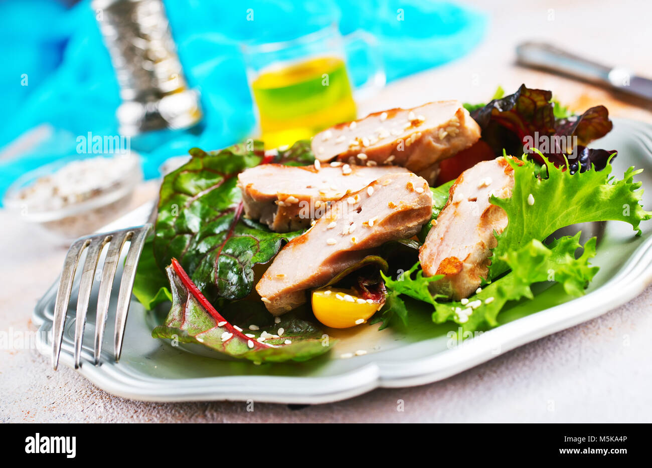 salad with fried tuna on the plate Stock Photo - Alamy
