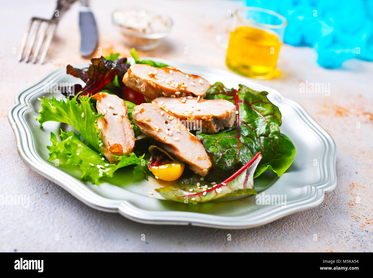 salad with fried tuna on the plate Stock Photo - Alamy