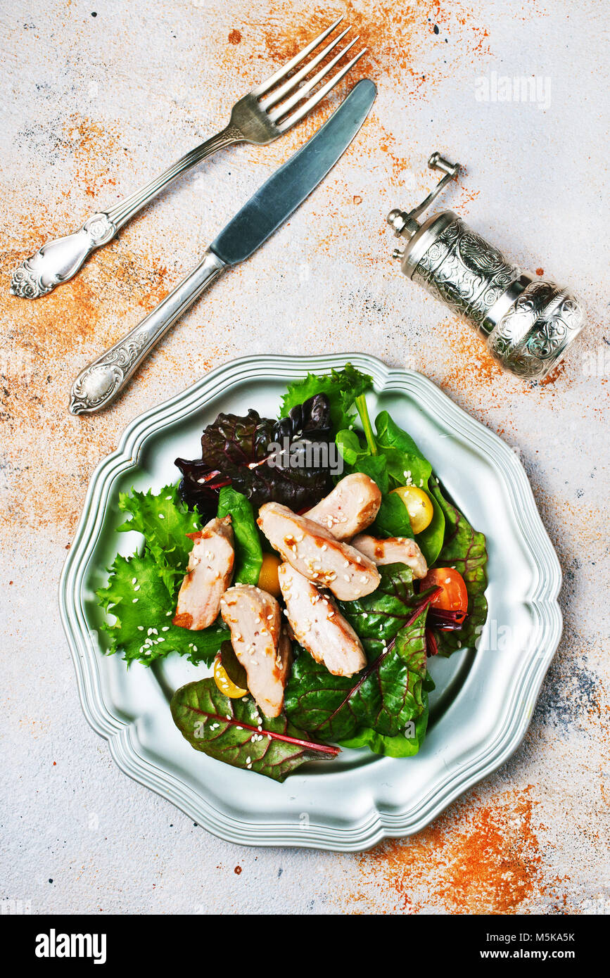 salad with fried tuna on the plate Stock Photo - Alamy