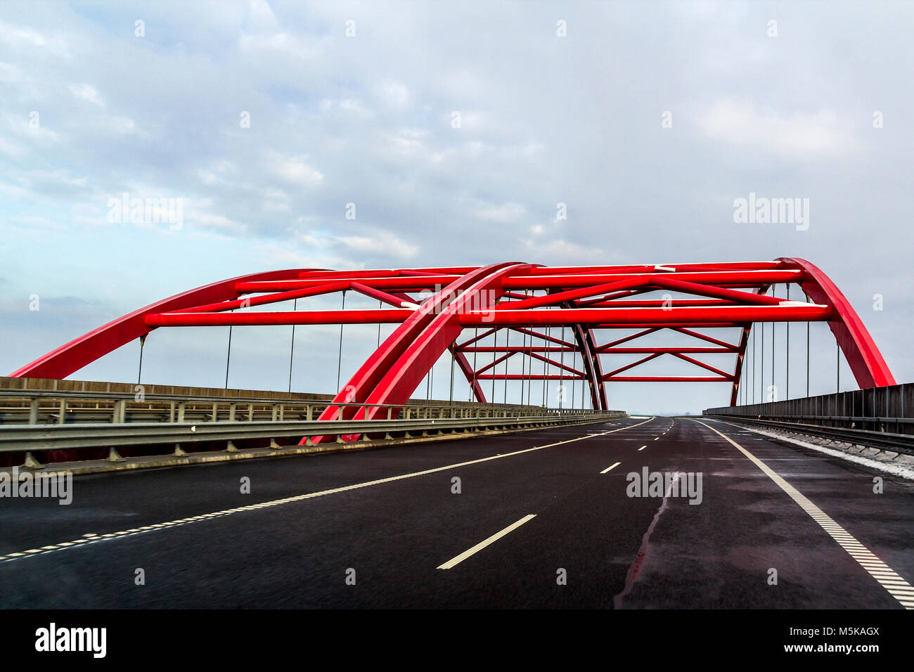 Metal frame structure of a bridge over a highway road Stock Photo - Alamy