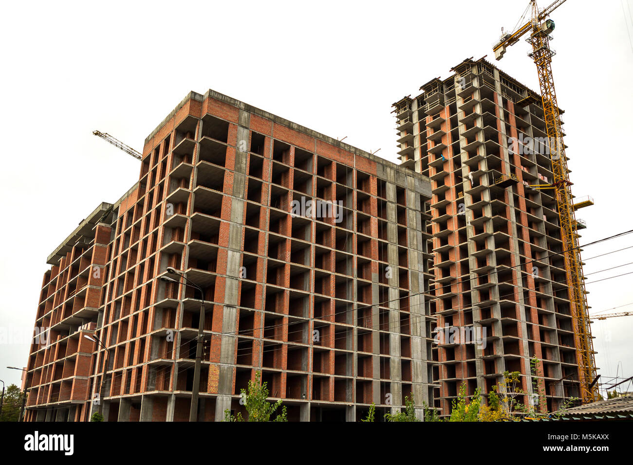 Ground view of a new modern residential house building under ...