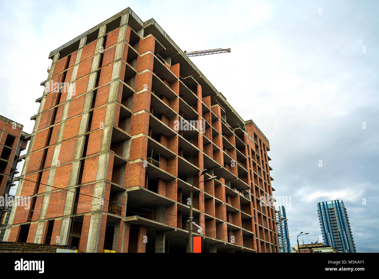 Ground view of a new modern residential house building under ...