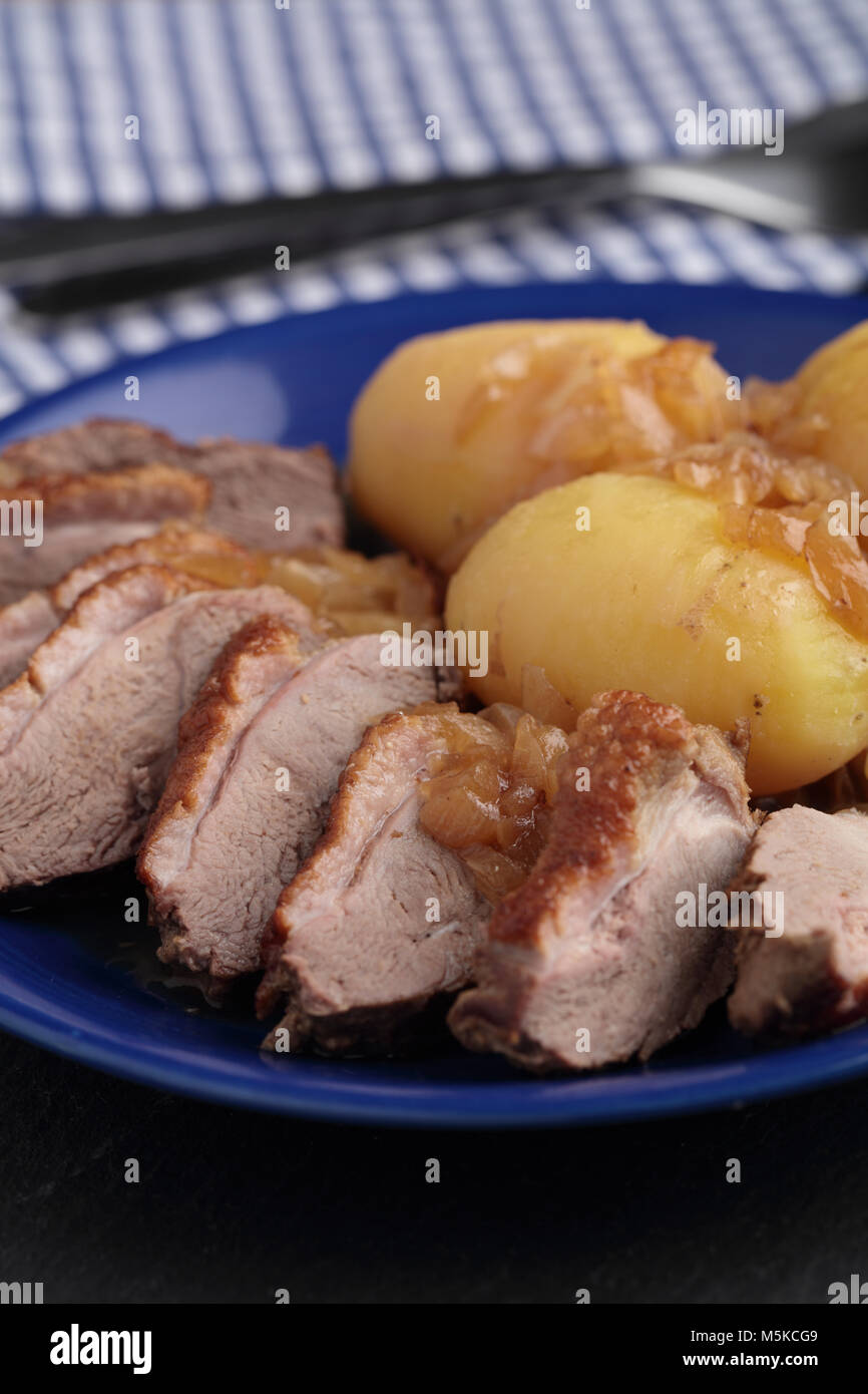 Roasted duck meat with boiled potato Stock Photo - Alamy
