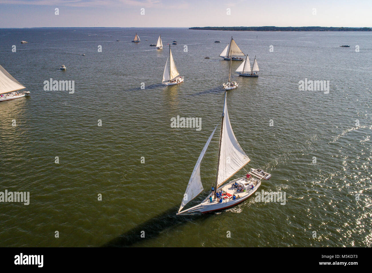 Aerial view showing off the mighty sails of a group of traditional ...