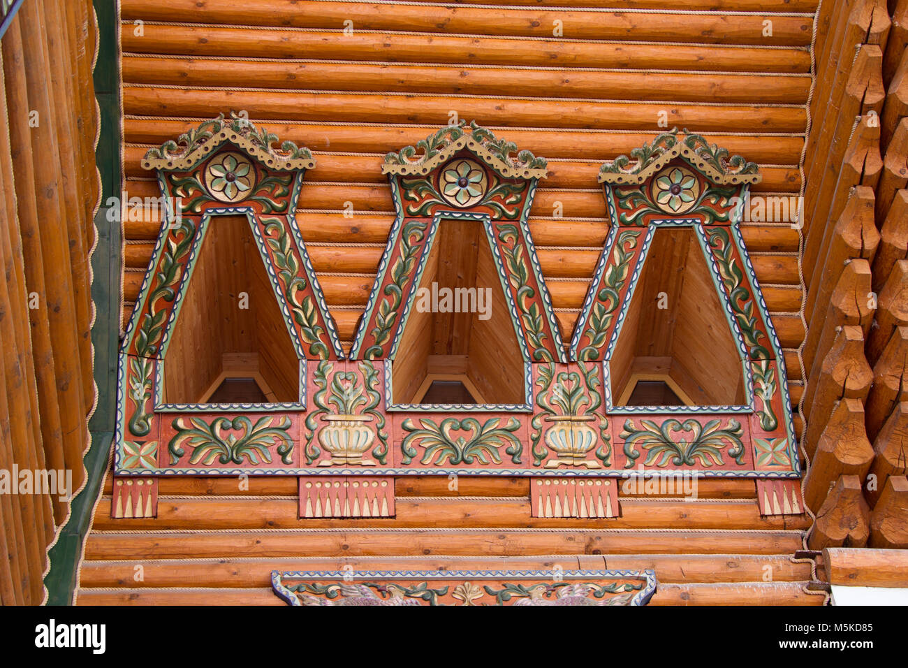 Wooden architecture. Russian block. Painted windows of ancient ...