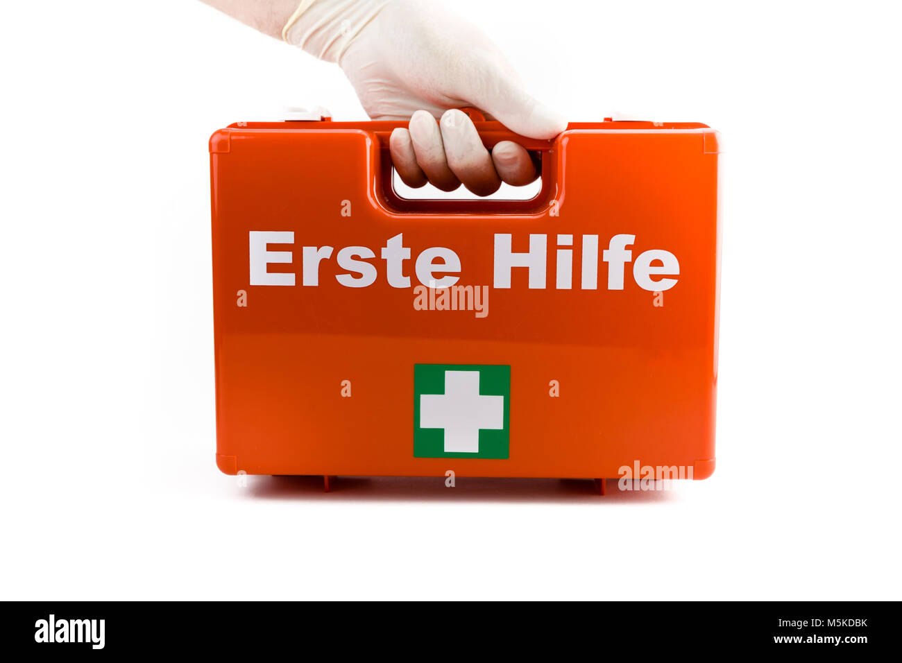 Doctors hands in white medical gloves holding first aid kit isolated on ...